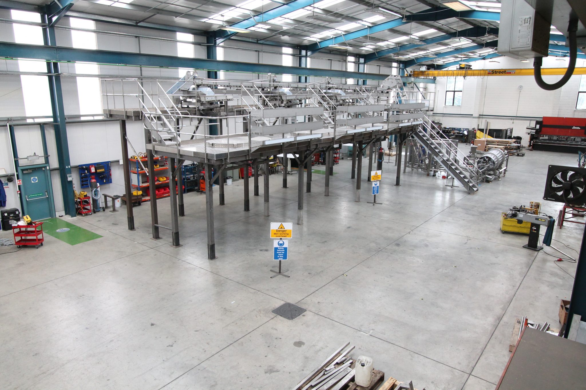 Elevating Conveyor Systems - KMG Systems